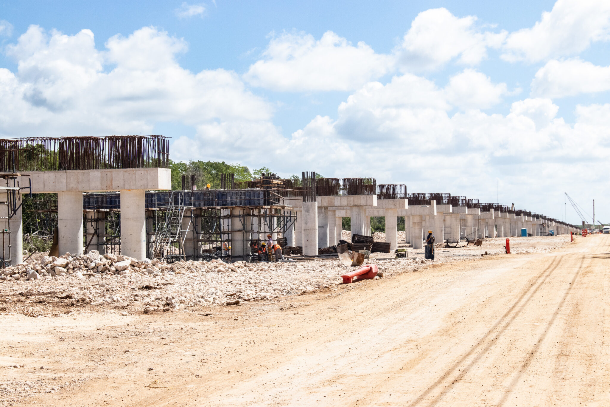 Construction efforts to elevate this portion of tram five of the Tren ...